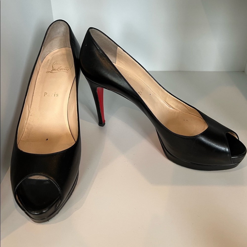 Christian Louboutin Peep Toed Pumps. - Gem